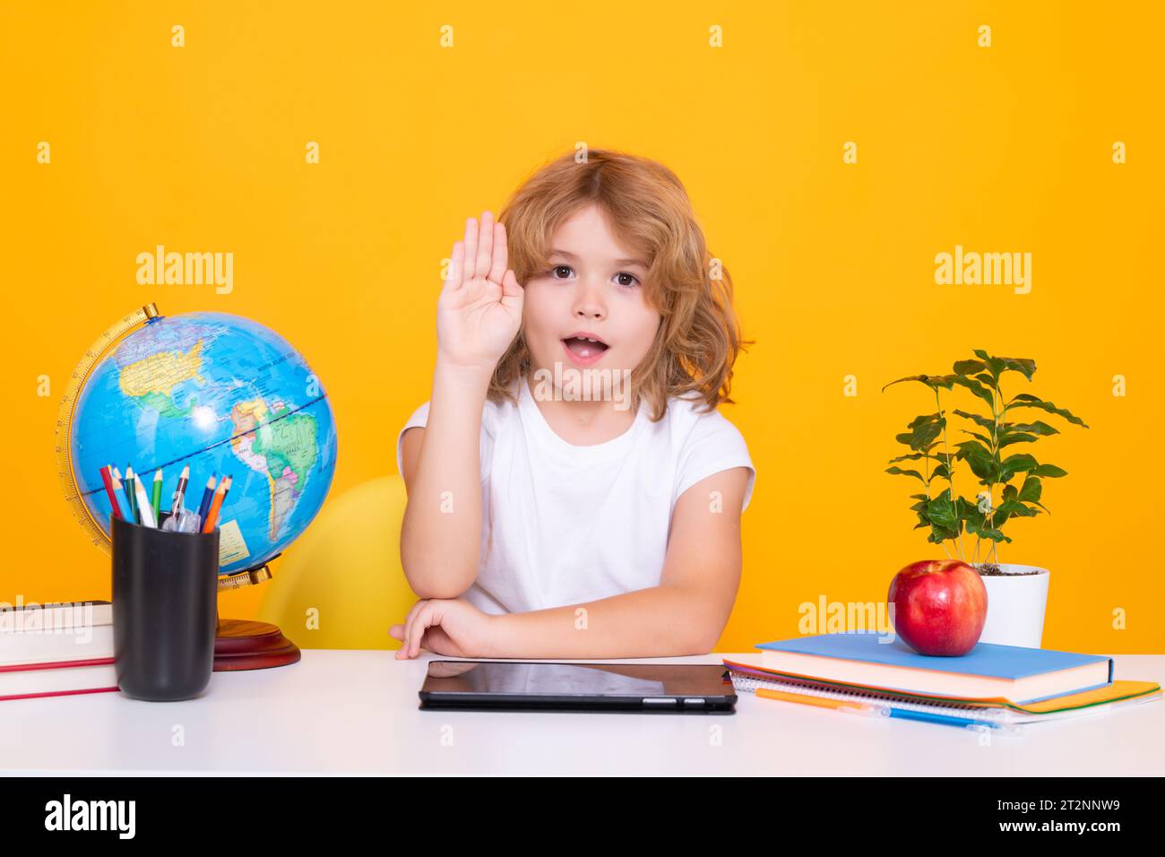 School child raising hands, willing to answer question. School and kids ...