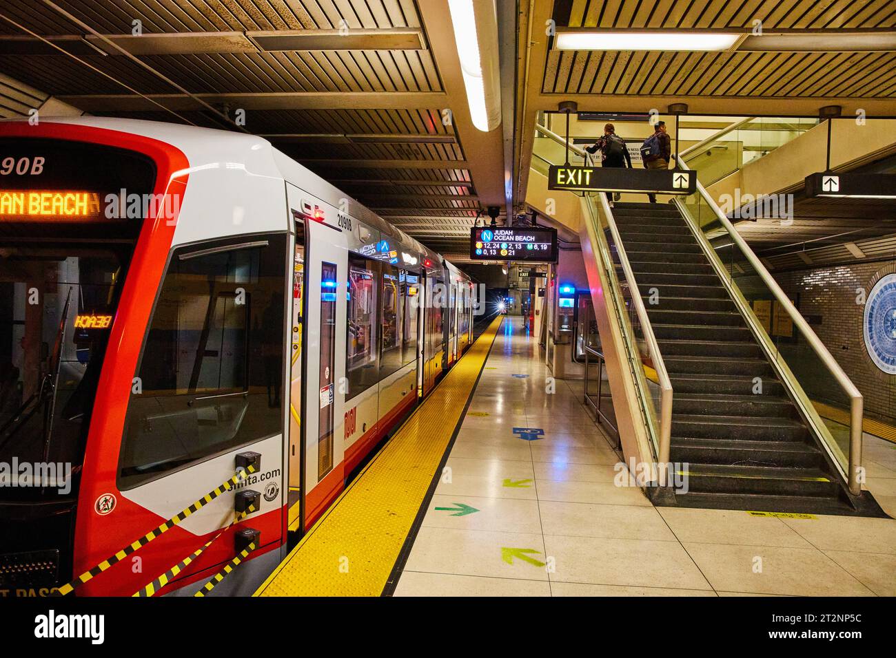 People going up exit from underground railway transportation system ...