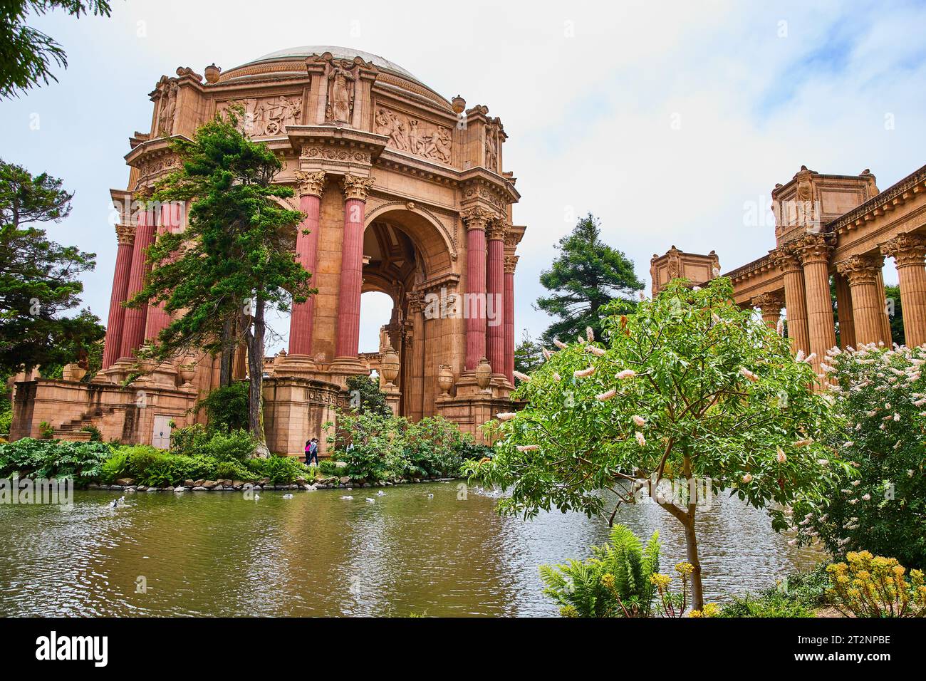 Trees around lagoon with open rotunda and Ancient Roman styled ...