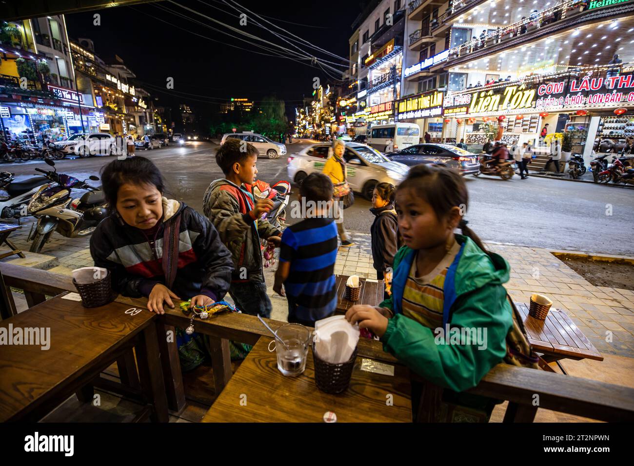 Begging kids in Sapa Vietnam Stock Photo - Alamy