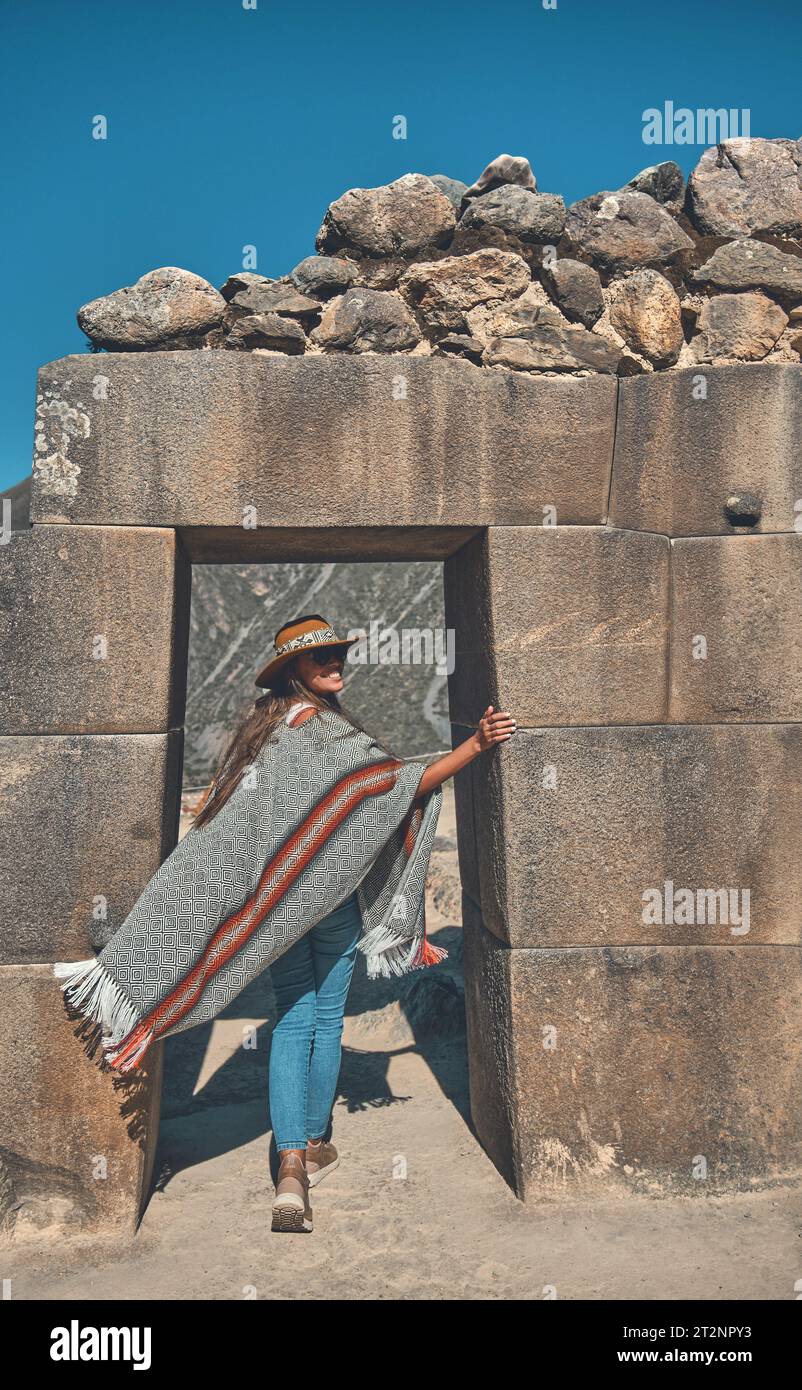 A Girl at the Entrance of ruins of Ollantaytambo Ruins in Sacred Valley ...