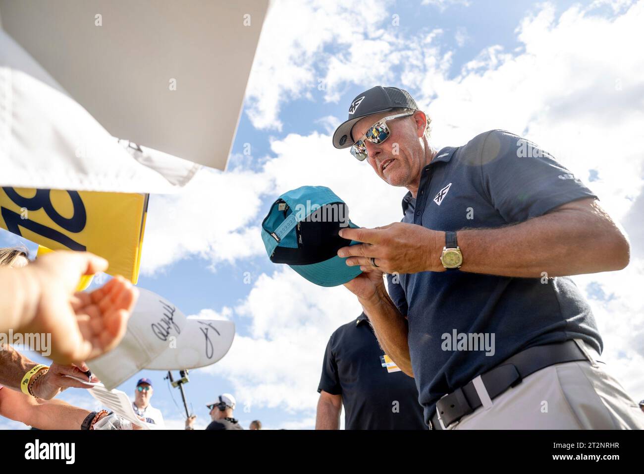 Captain Phil Mickelson of HyFlyers GC signs his autograph after his ...