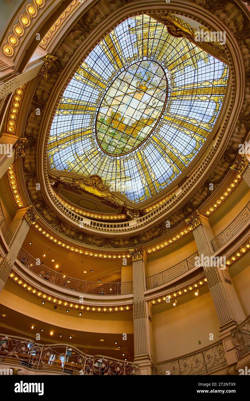 Elaborate golden decor of stained glass window mosaic on glass ceiling ...