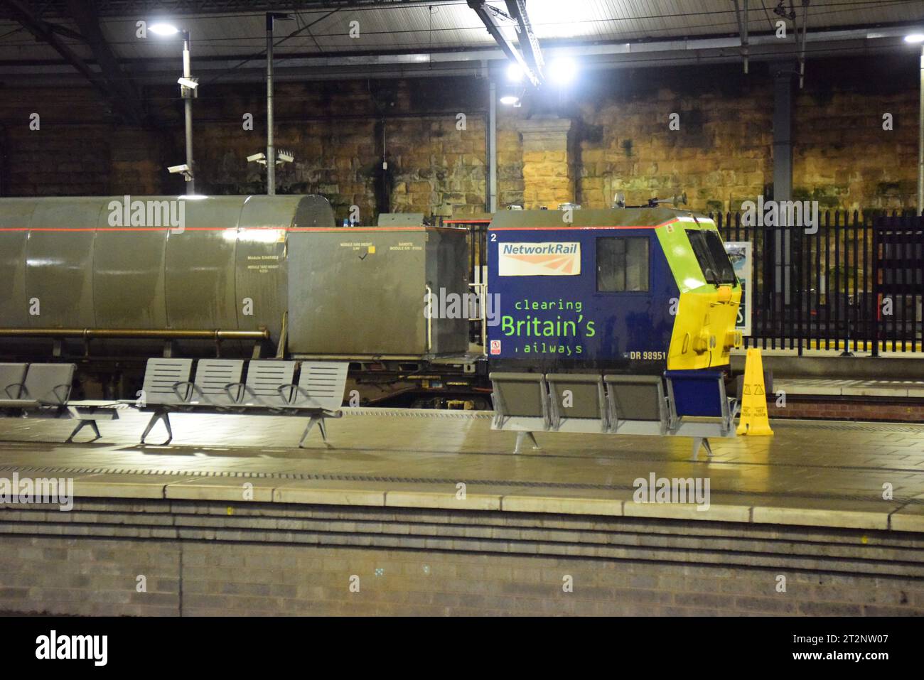 A Network Rail train carries the message: 'Clearing British Railways ...