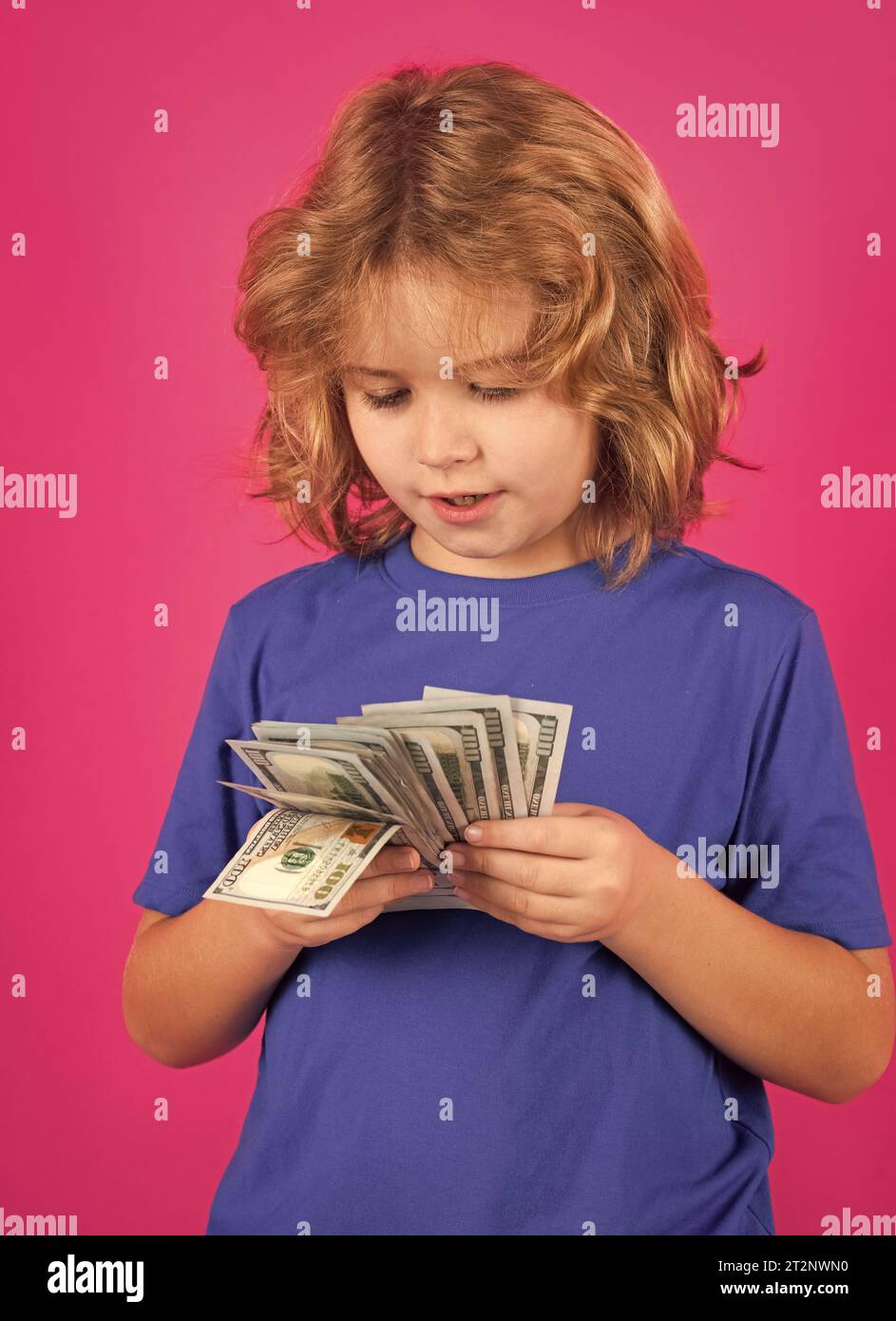 Money bills, salary payment. Studio portrait of child with money ...