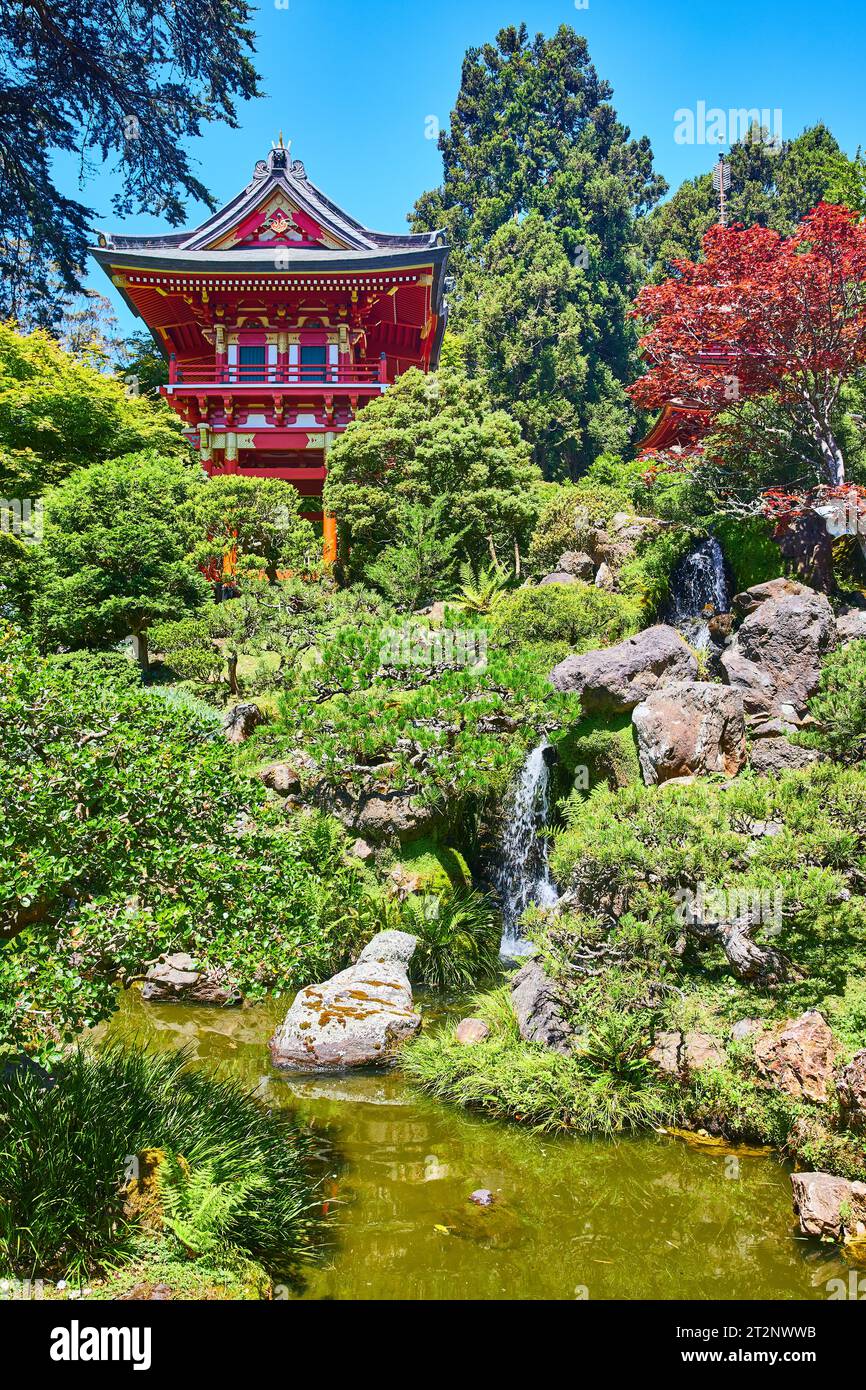 Red pagoda in Japanese Tea Garden on bright summer day with bright blue ...