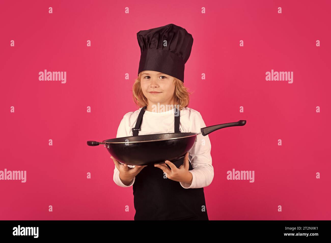 Kid chef cook cookery with pan. Cooking children. Chef kid boy making ...