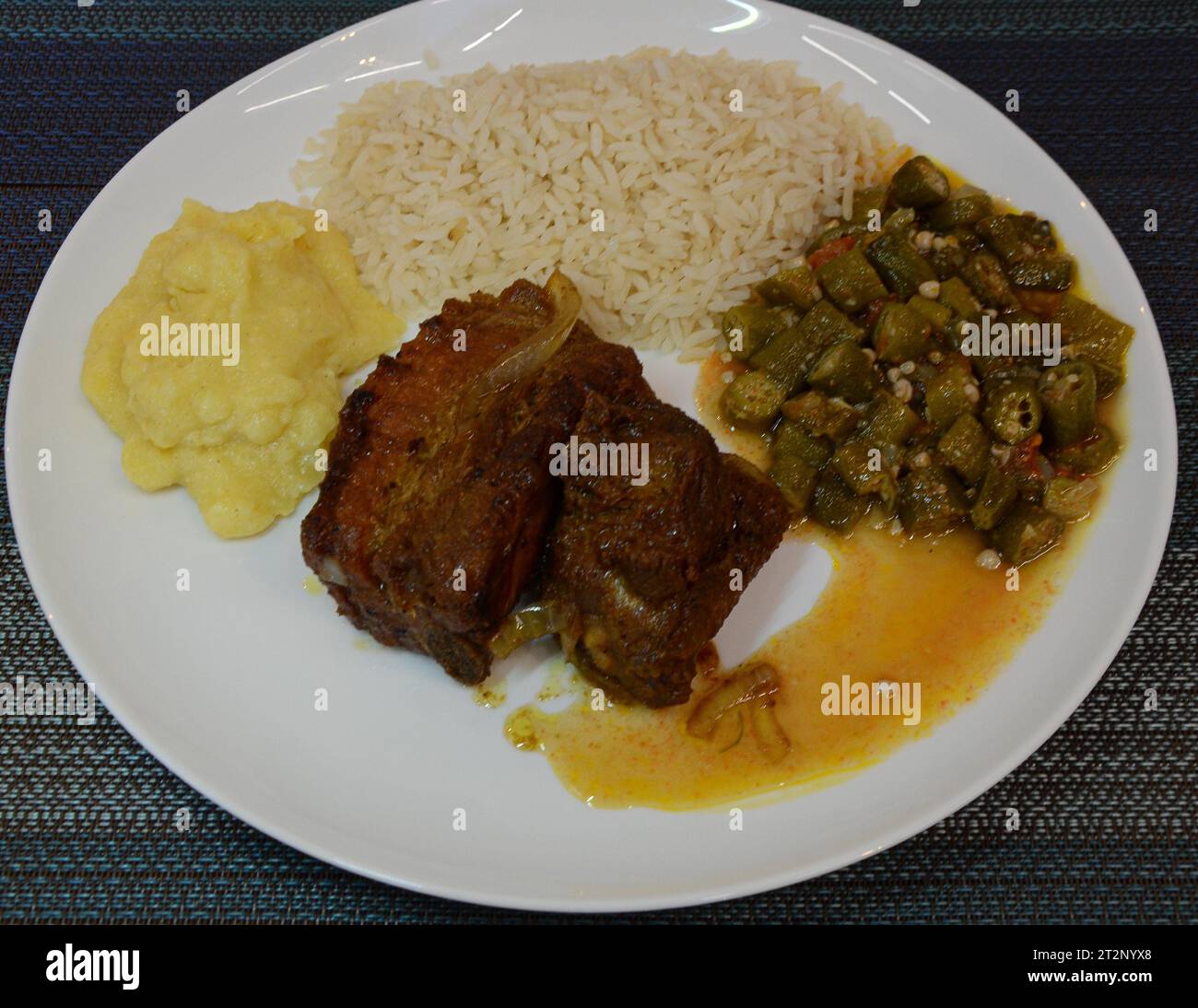 Executive dish, with ribs, okra, angu, rice and beans, typical Minas ...