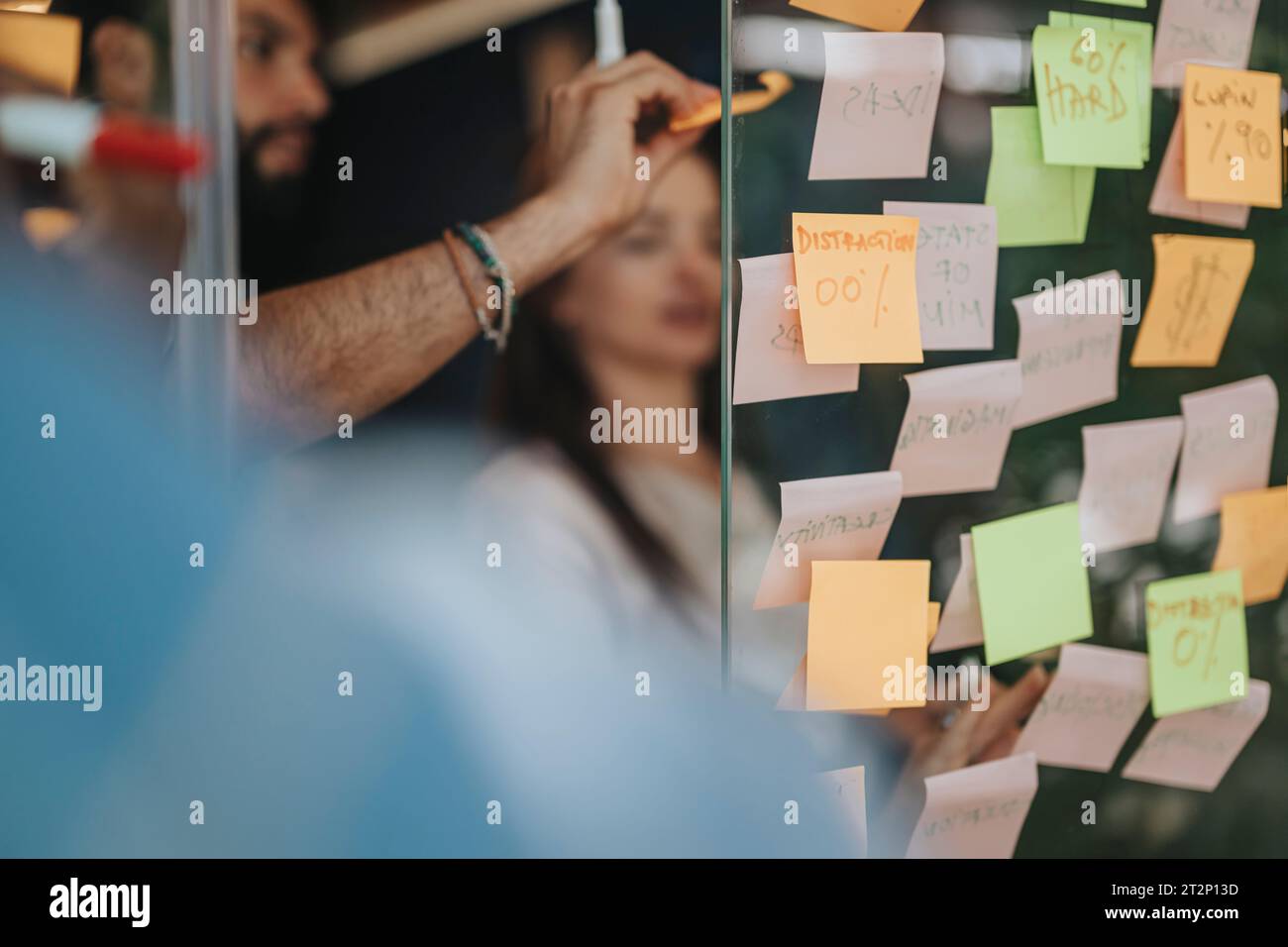 Collaborative Business Group Brainstorming Ideas on Glass Wall with ...