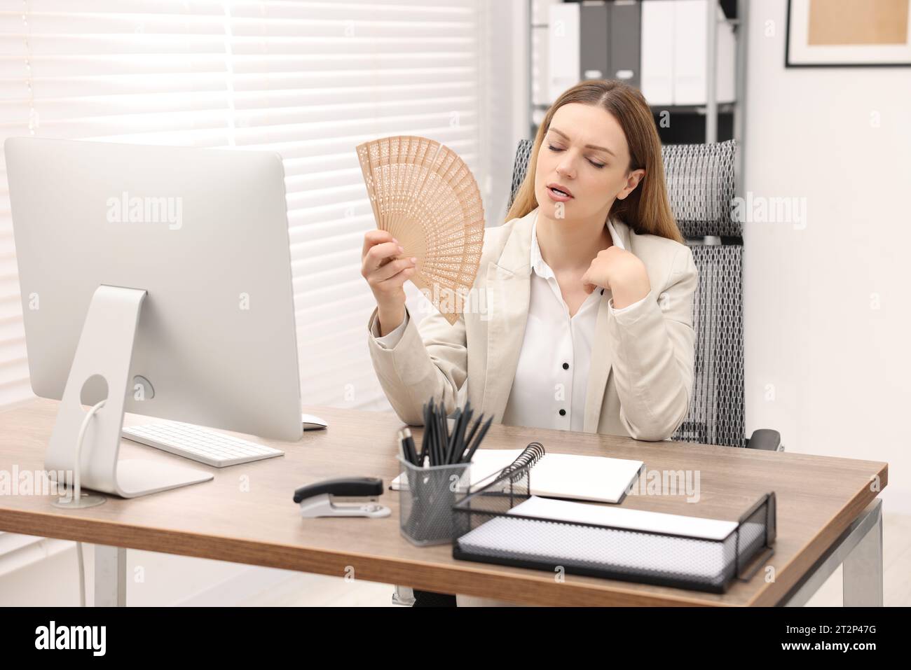 Adult businesswoman waving hand hi-res stock photography and images - Alamy