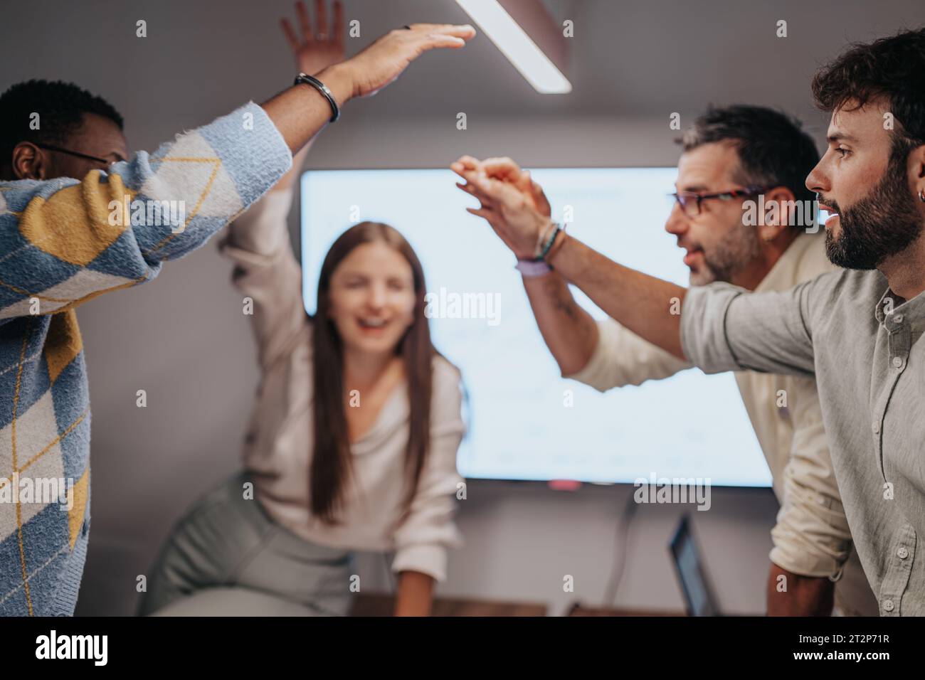 Business Professionals Collaborating on Architectural Plans in a ...