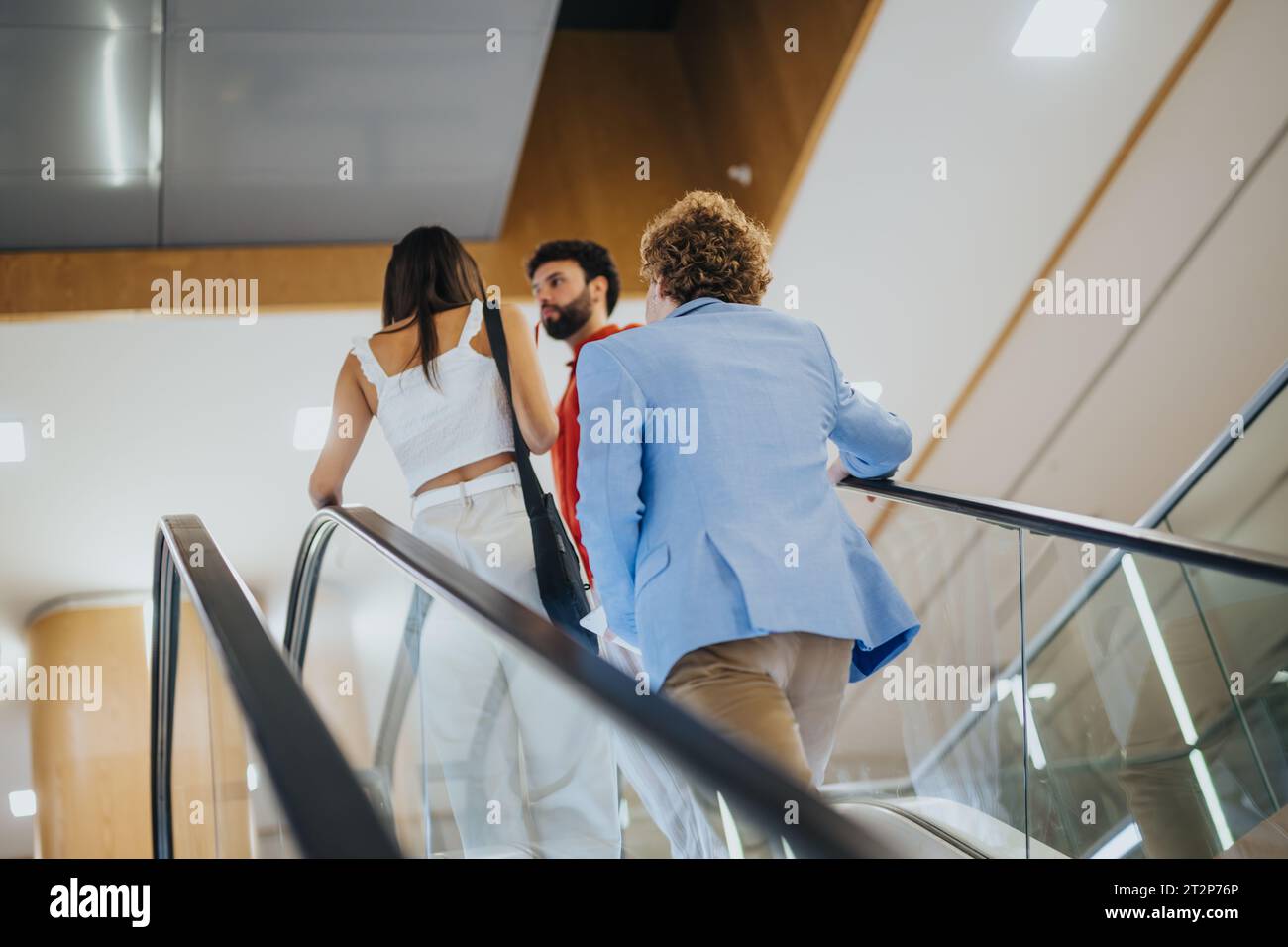 Architects and engineers discussing project details outdoors in a city ...