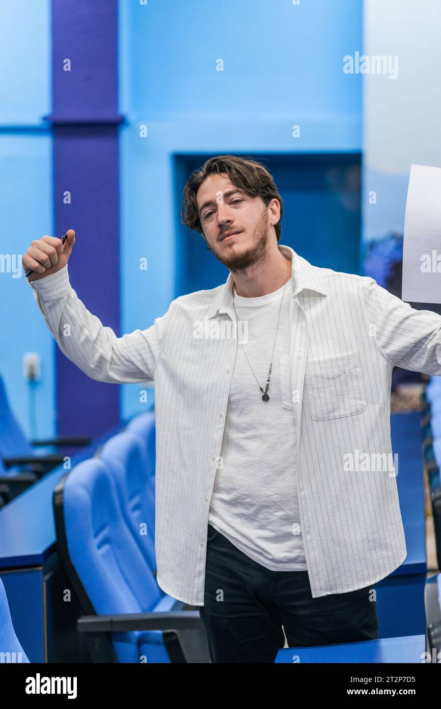 Male student posing after successfully passed exam at university Stock ...