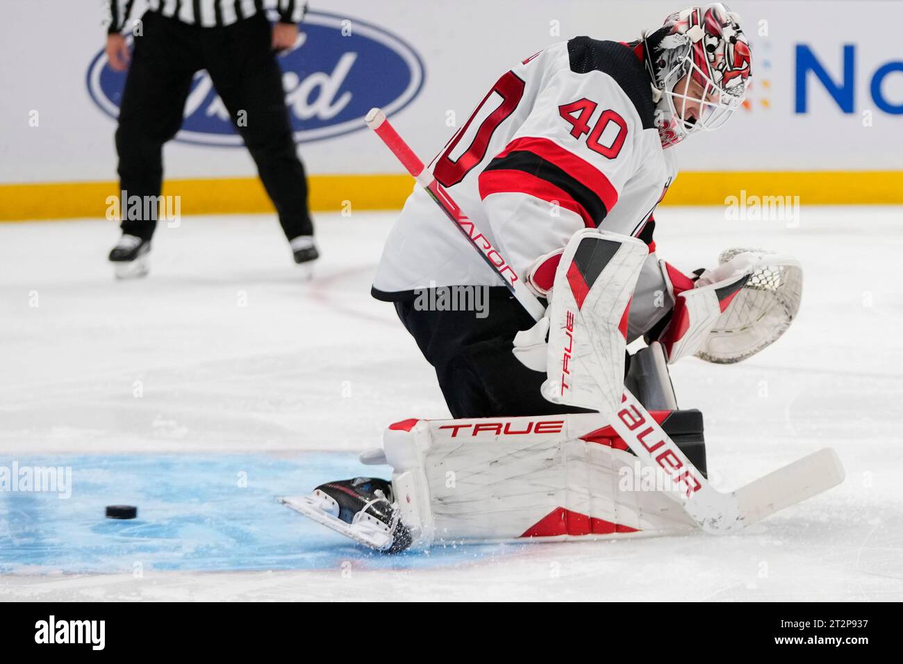 A puck shot by New York Islanders' Brock Nelson gets past New Jersey ...