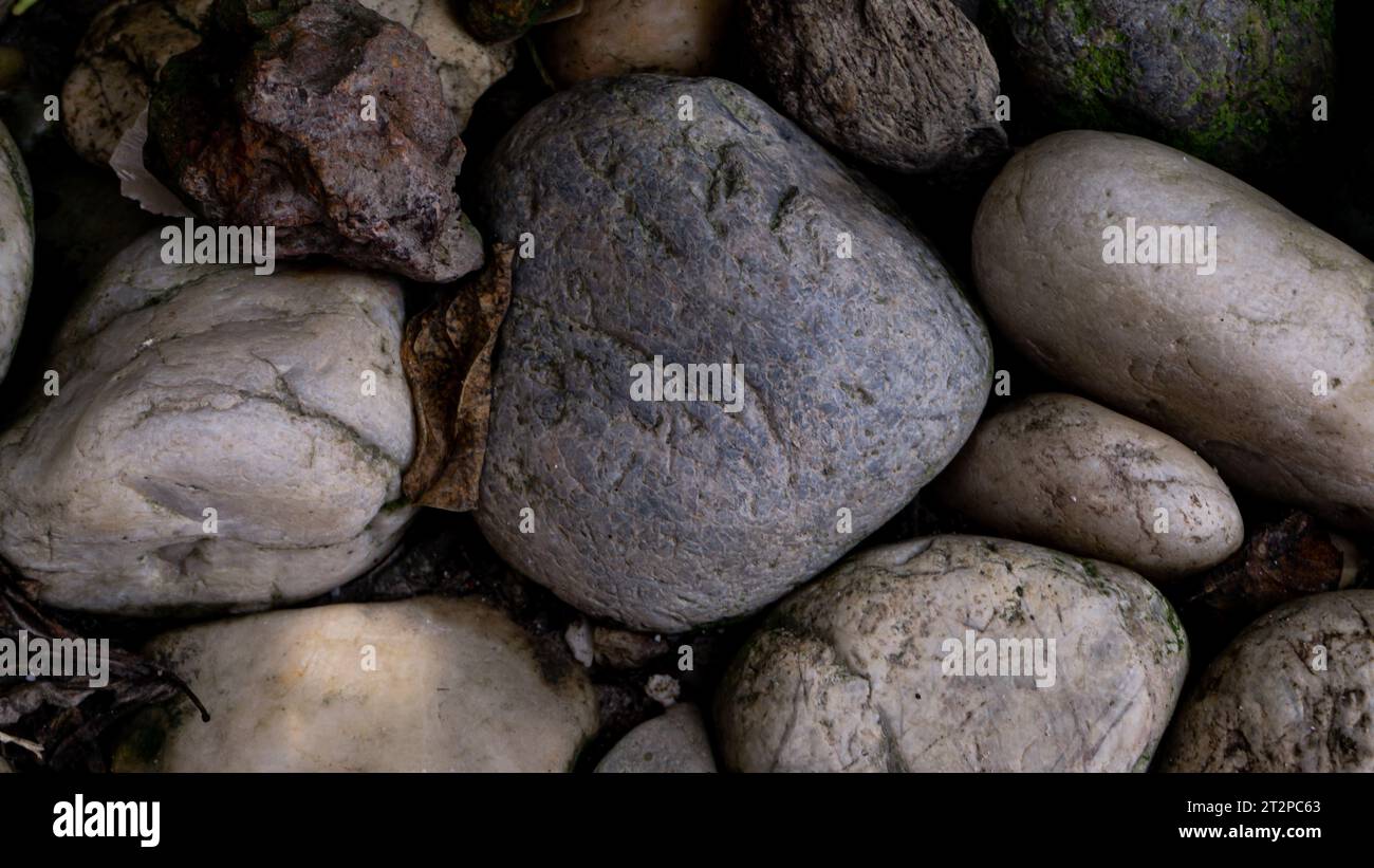 Scattered stone texture. Suitable for background Stock Photo - Alamy
