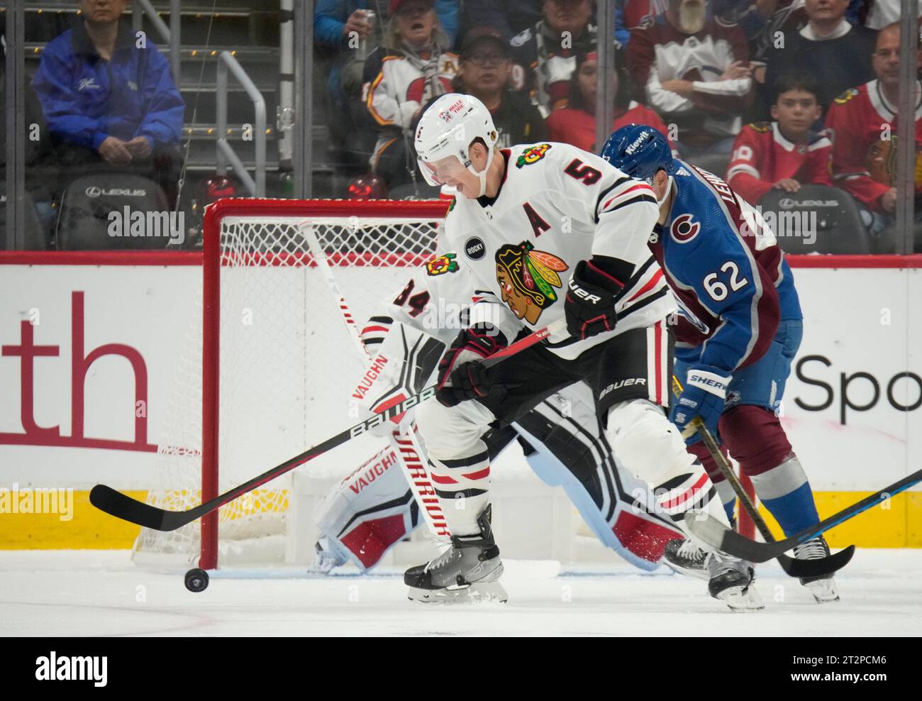 Chicago Blackhawks defenseman Connor Murphy (5) clears the puck as ...