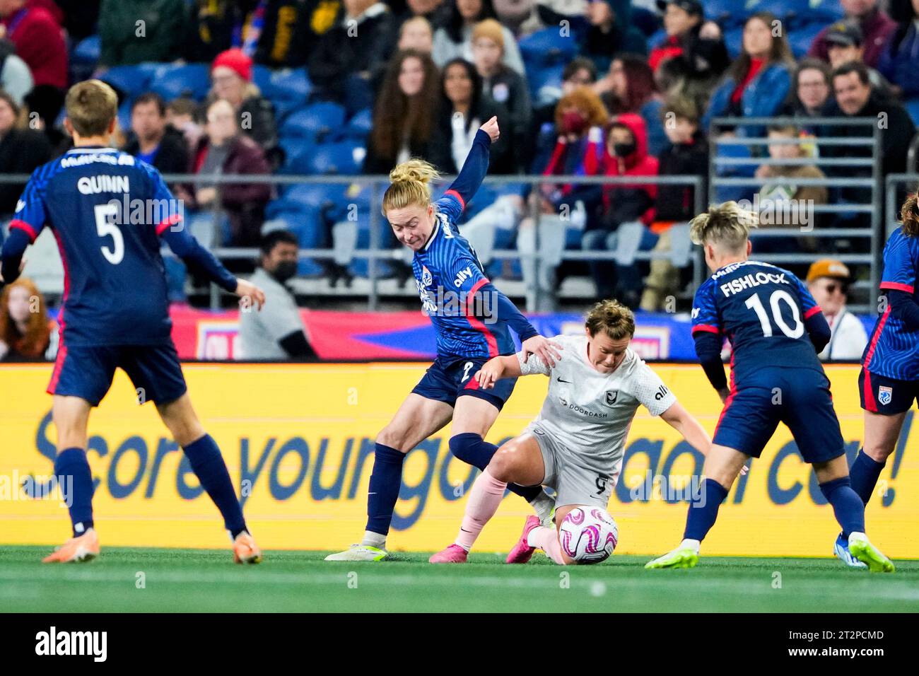 Angel City FC midfielder Savannah McCaskill (9) falls against OL Reign ...