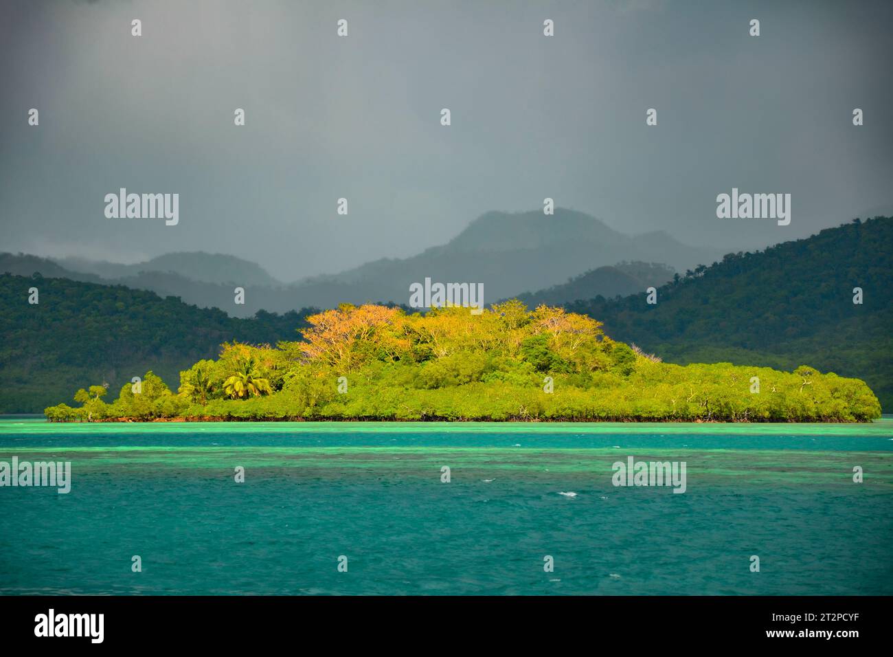 "A place under the sun". Brightly lit by the sun a small tropical ...