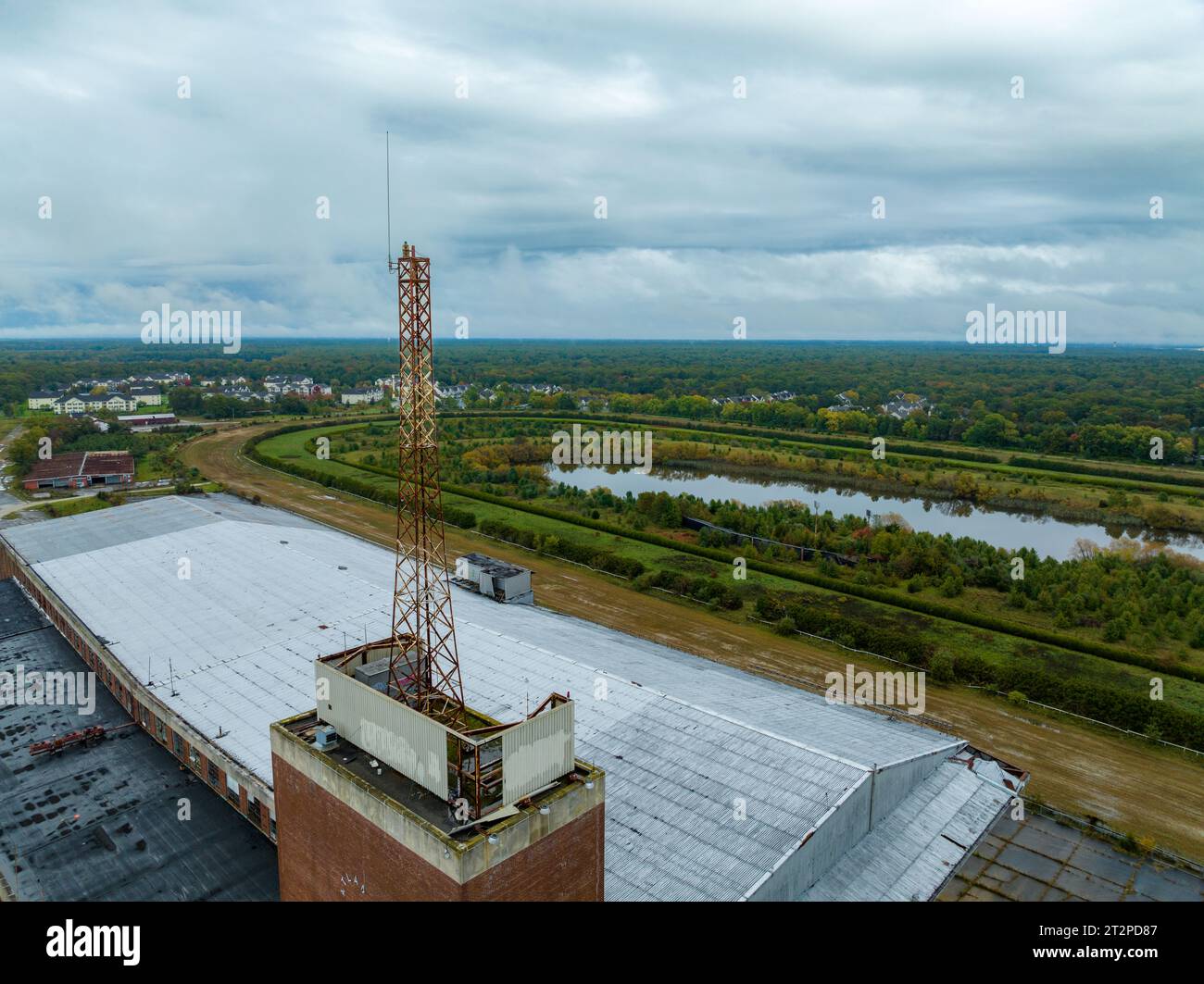 Old television and radio tower in faded colors with rusty structural ...