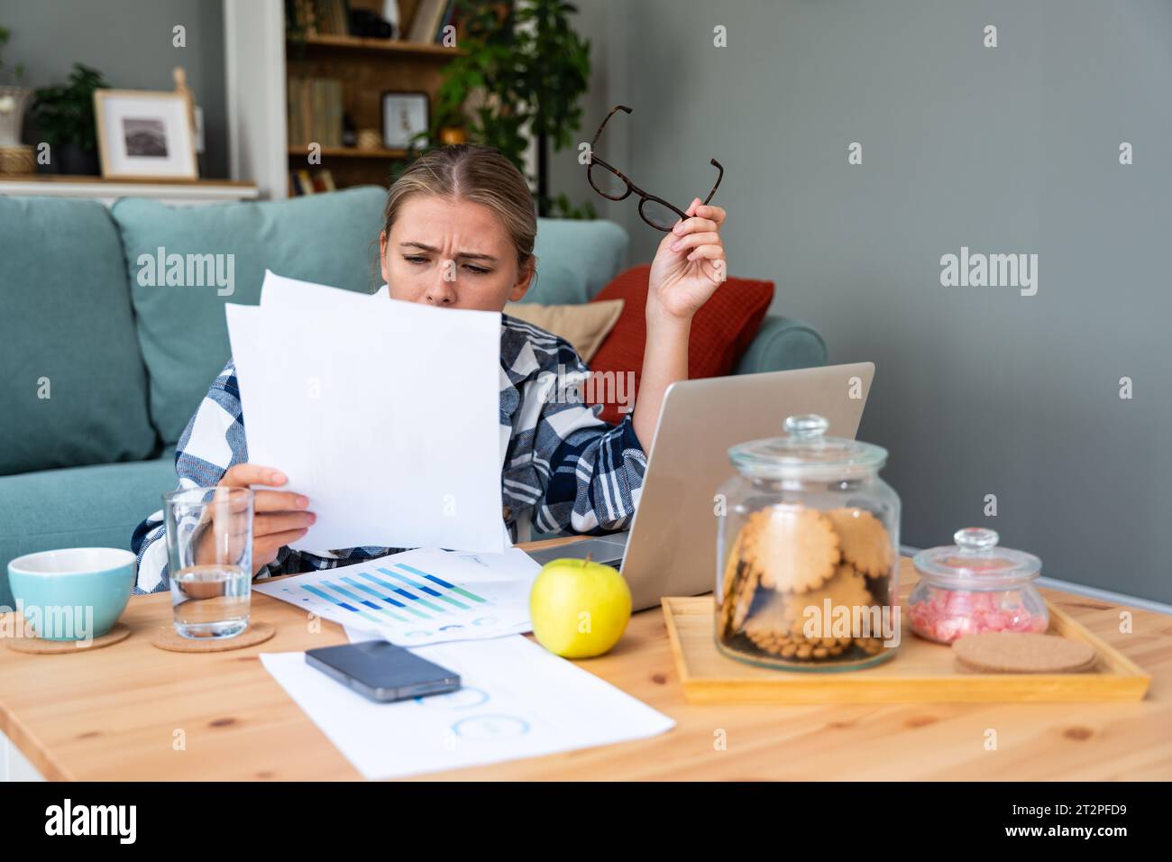Young business woman owner of small start up company, accountant ...
