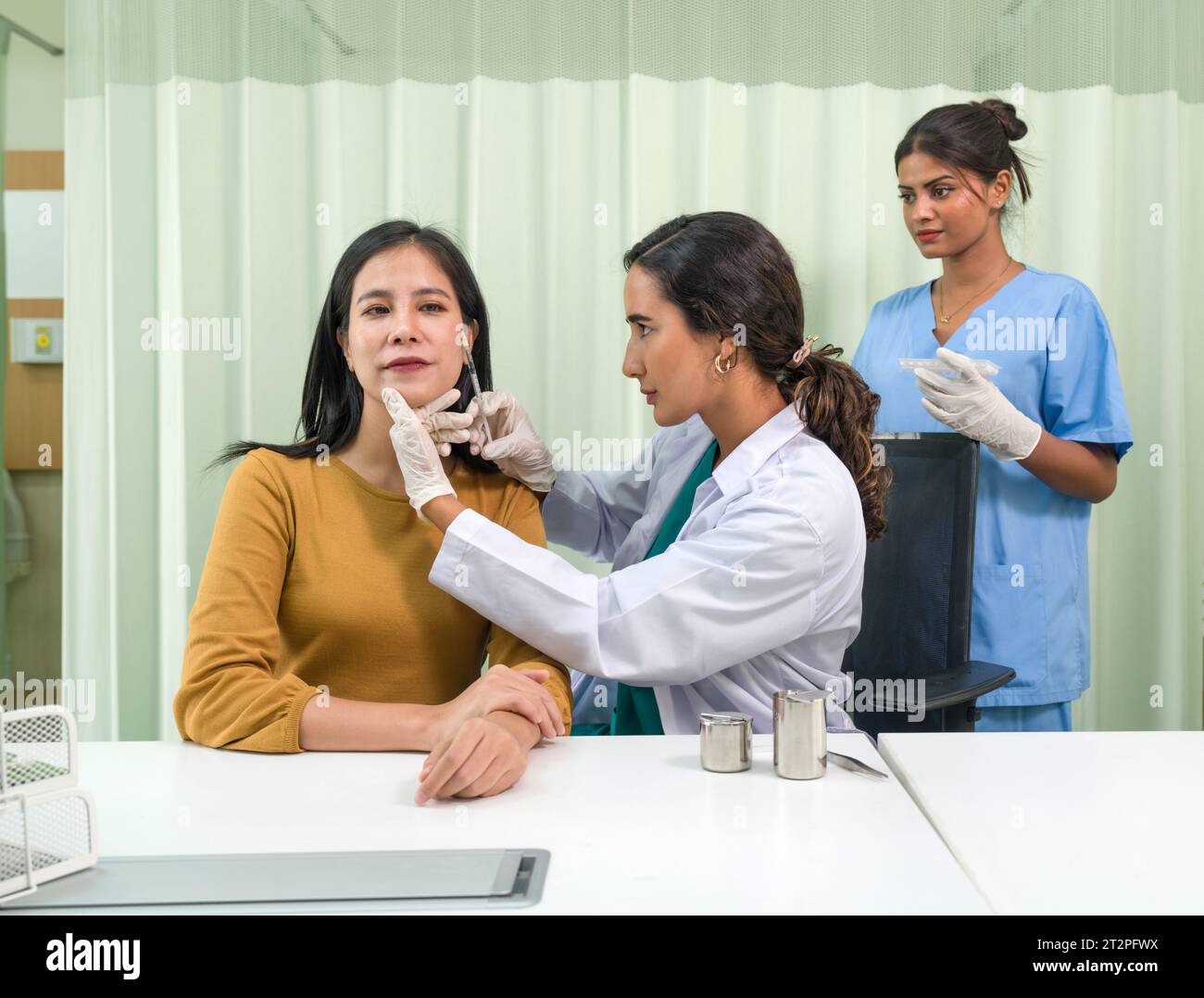 Closeup inspection by dermatologist examining facial skin condition of ...