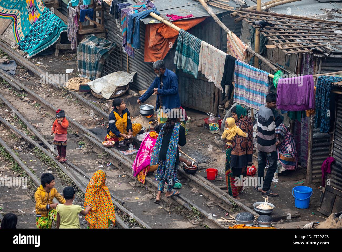 Life in the slums by the railway tracks in Tejgaon. Dhaka, Bangladesh ...