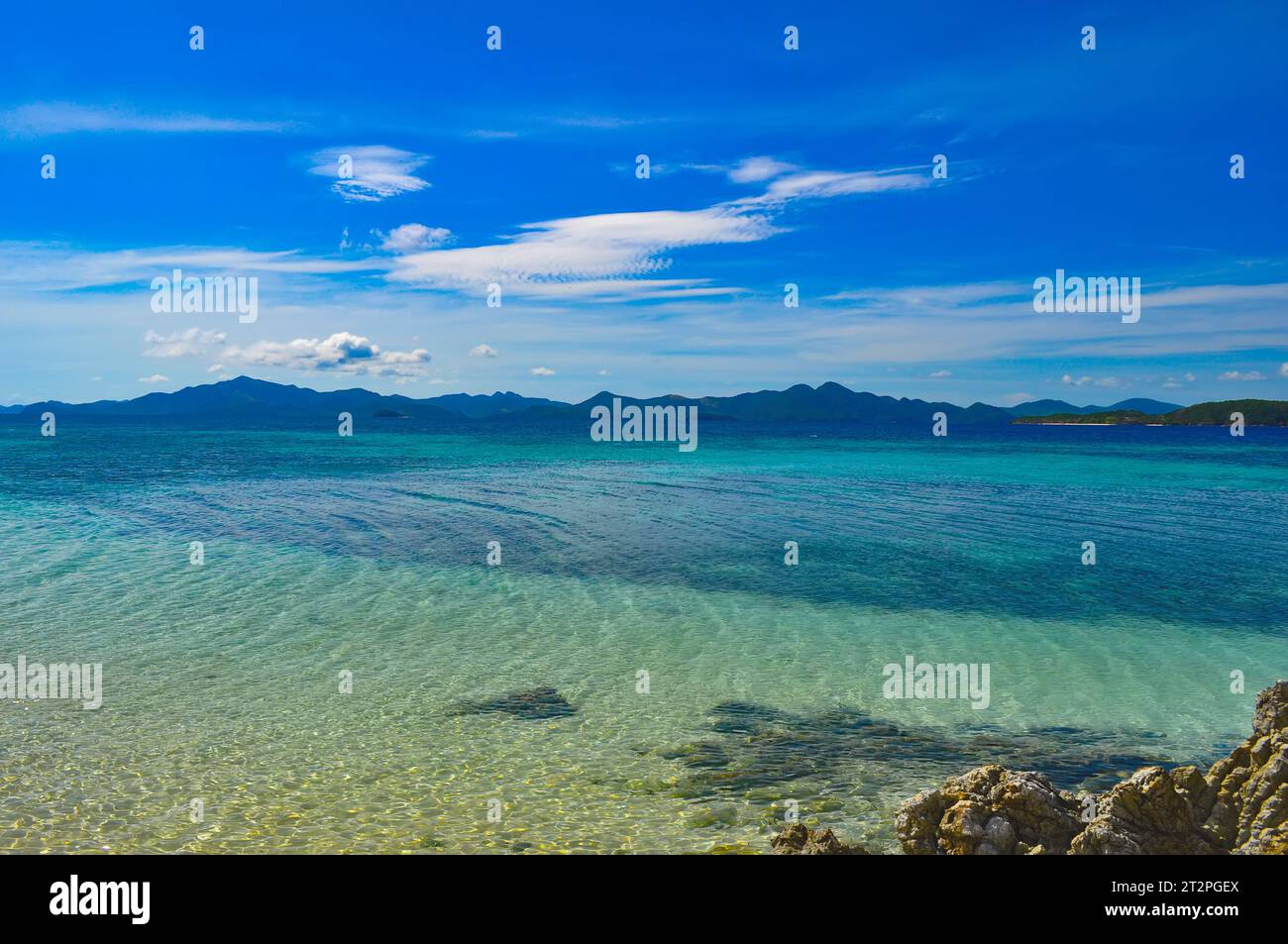 Seascape with a ridge and crystal clear sea water in the Coron Bay. The ...