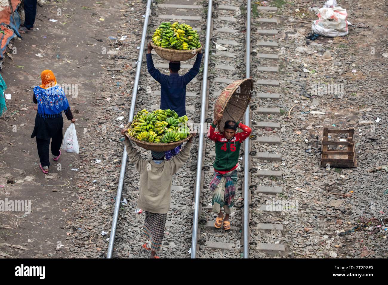 Life in the slums along the railway tracks in Tejgaon, Dhaka ...