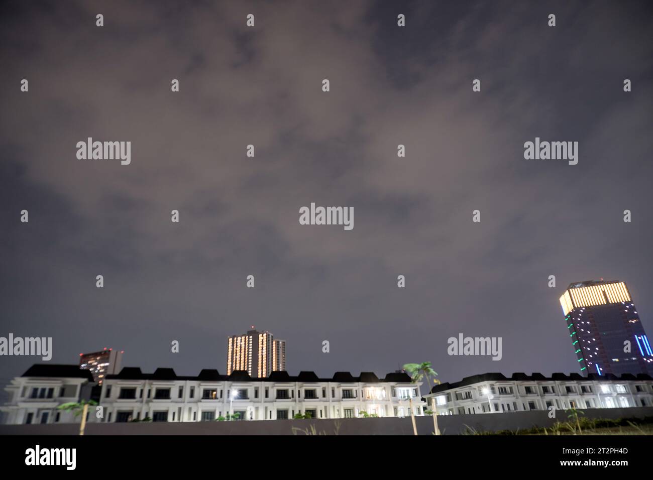 housing ready for habitation, seen from behind with a backdrop of tall ...
