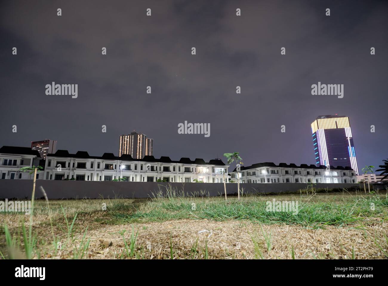 housing ready for habitation, seen from behind with a backdrop of tall ...