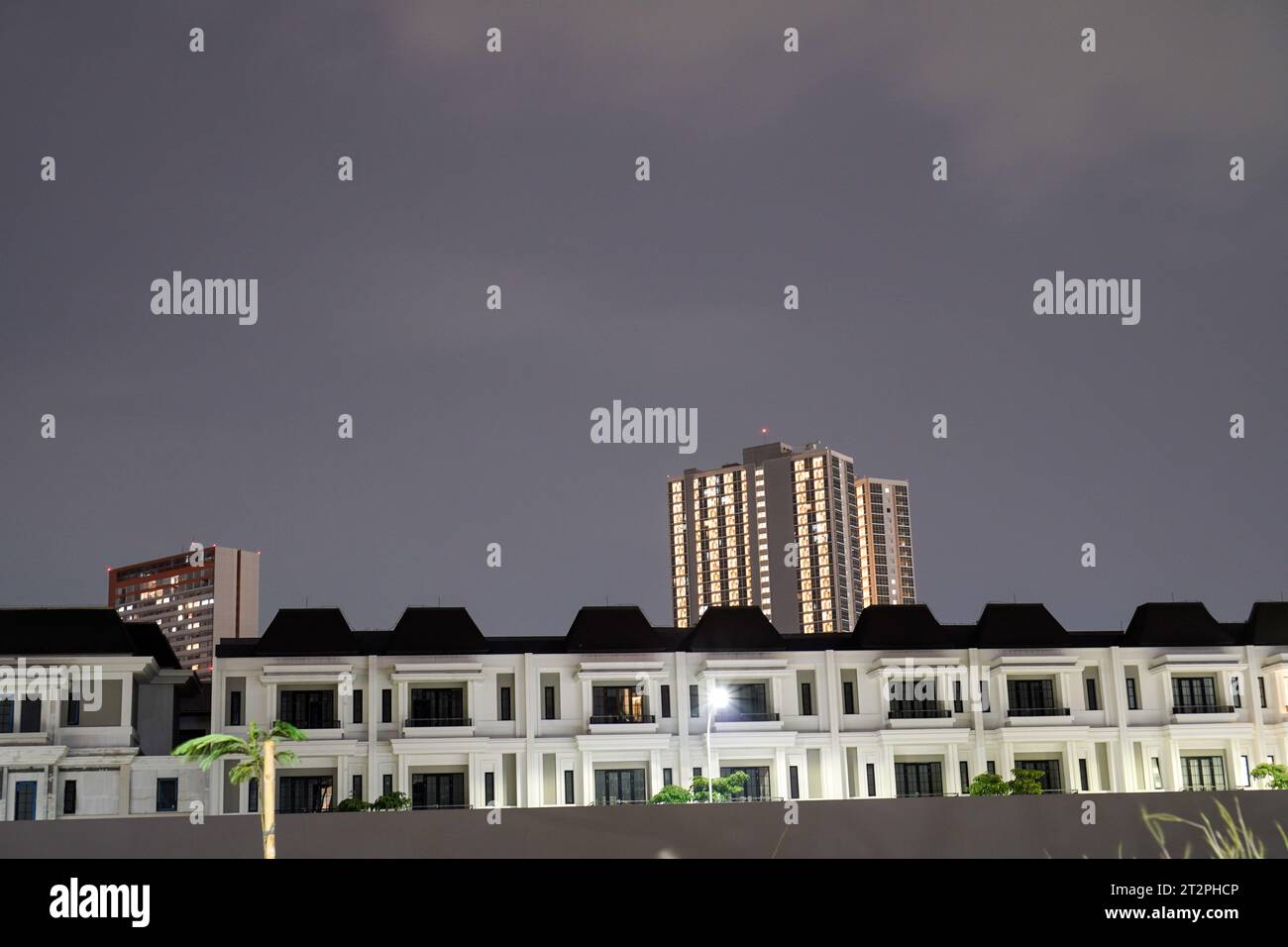 housing ready for habitation, seen from behind with a backdrop of tall ...
