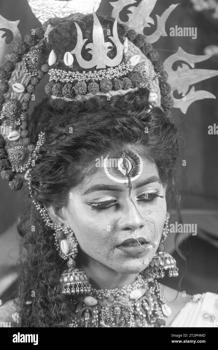 Portrait of beautiful Indian girl of Durga Idol Agomoni Concept Indoor ...
