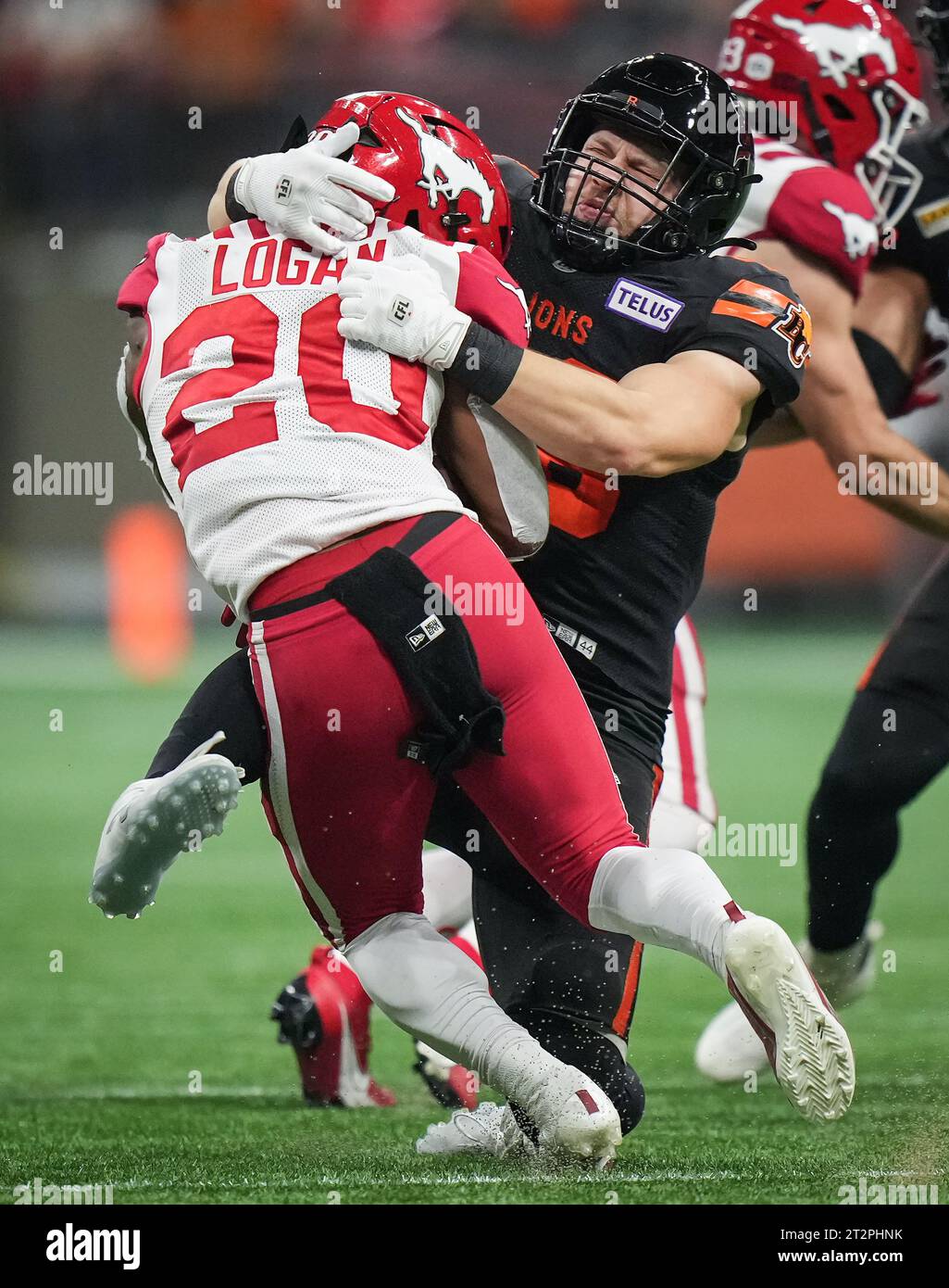 Vancouver, Canada. 20th Oct, 2023. B.C. Lions' Ryder Varga, back right, tackles Calgary ...