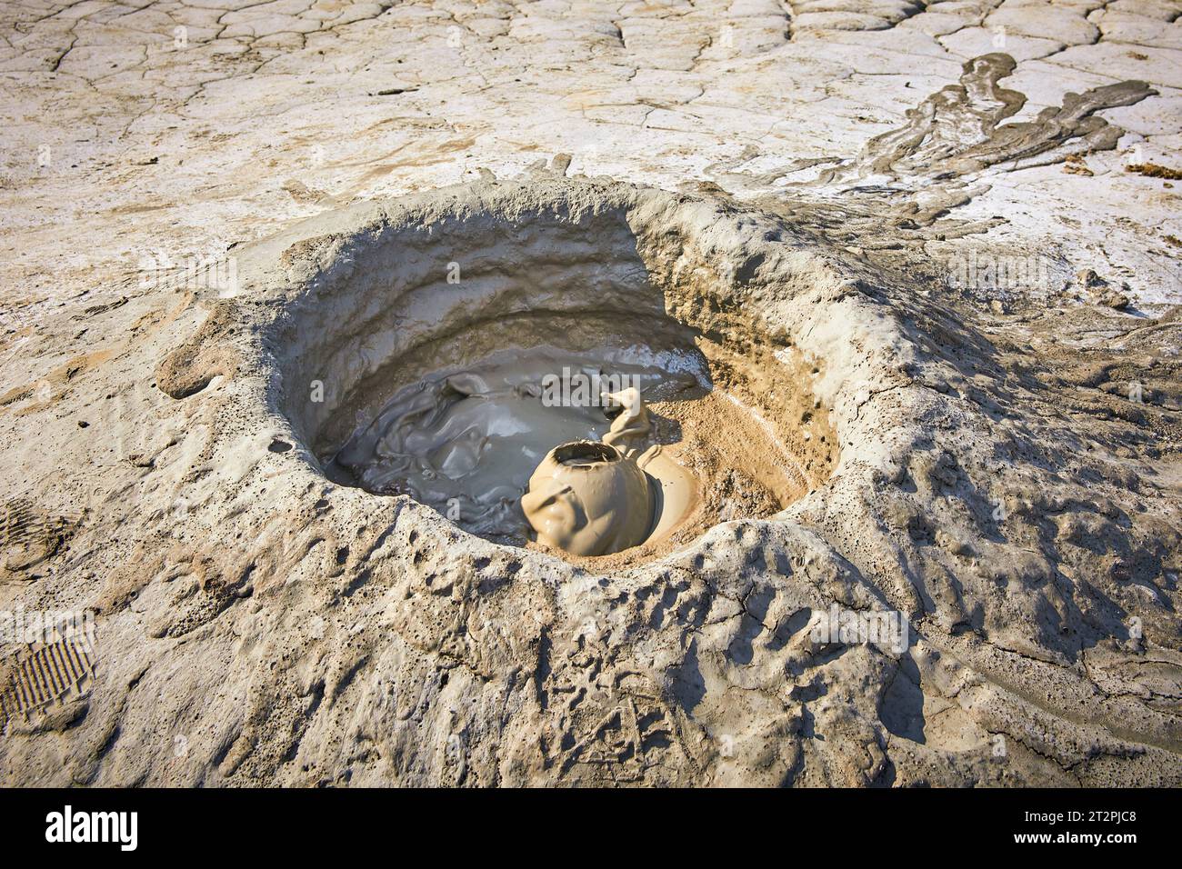cones of mud volcanoes from which rivers of mud flow Stock Photo - Alamy