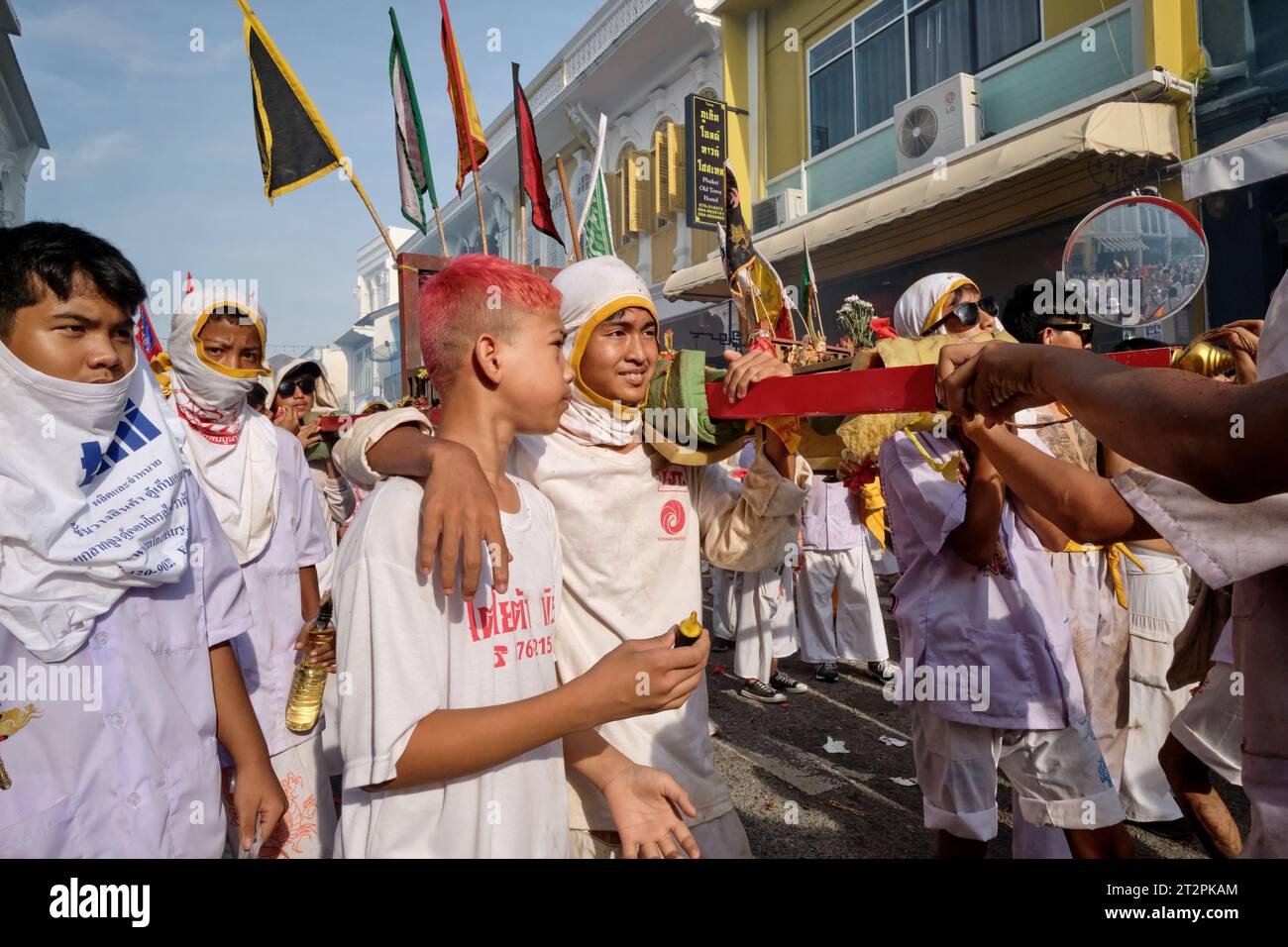 Palanquin bearers in a procession during the Vegetarian Festival (Nine ...