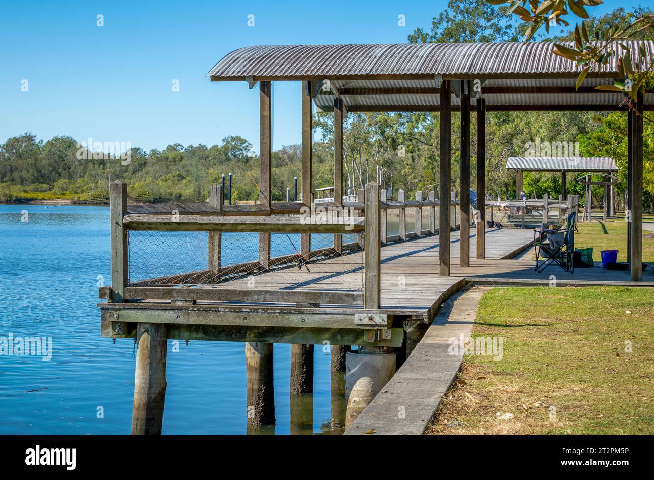 Fishing along river bank at Deep Water Bend Brisbane Queensland ...