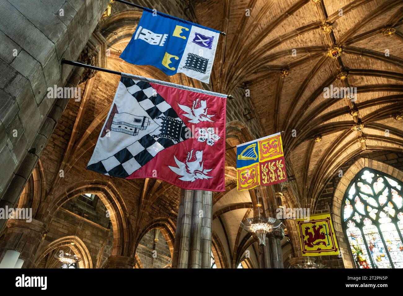 looking up at legion flags, interior of St. Giles Cathedral, Edinburgh ...