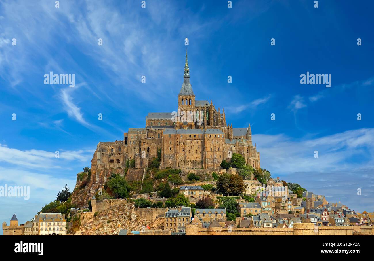 Hill with the ancient abbey of Mont Saint Michel in Normandy in ...