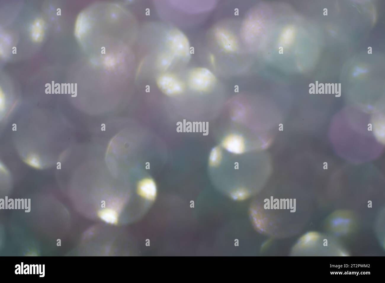 Colored photo background out of focus photographed with lens flares as ...