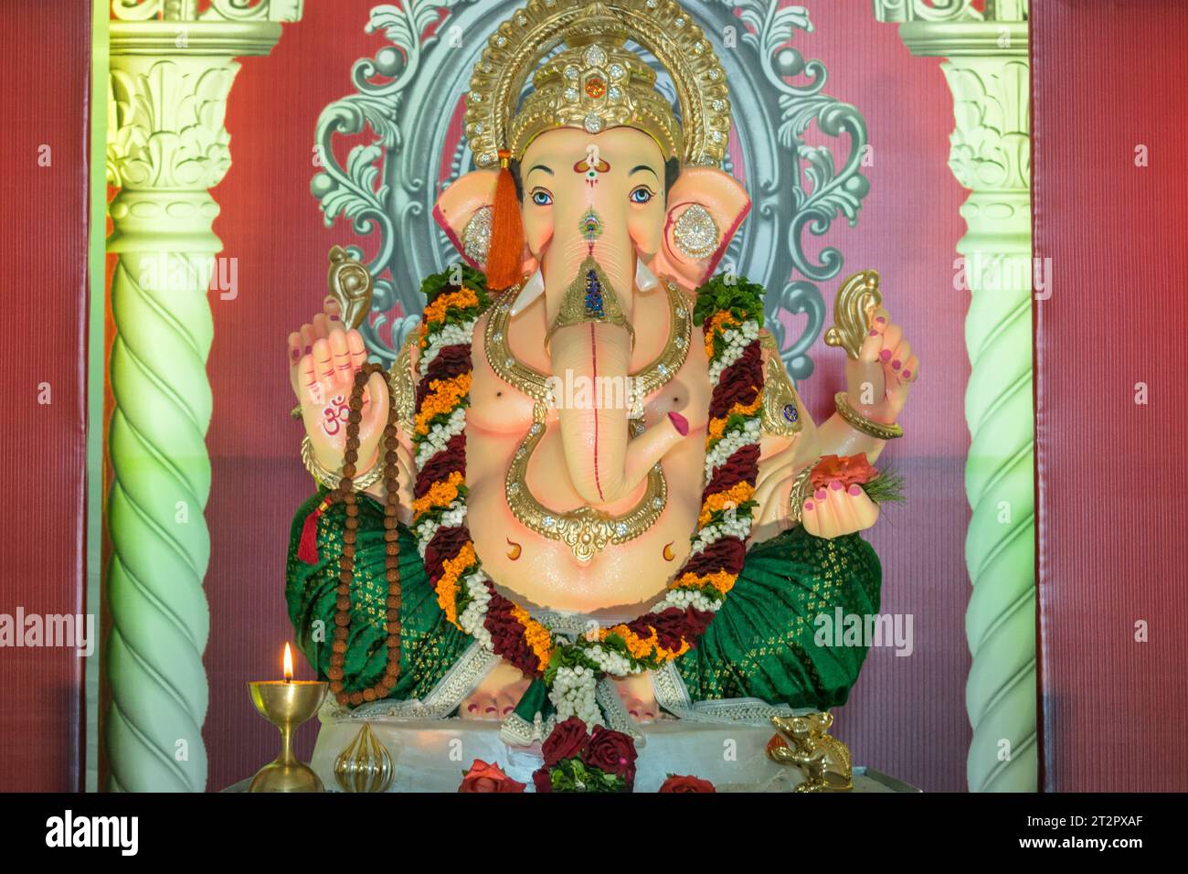 A beautiful idol of Lord Ganesha being worshipped at a mandal in Mumbai ...