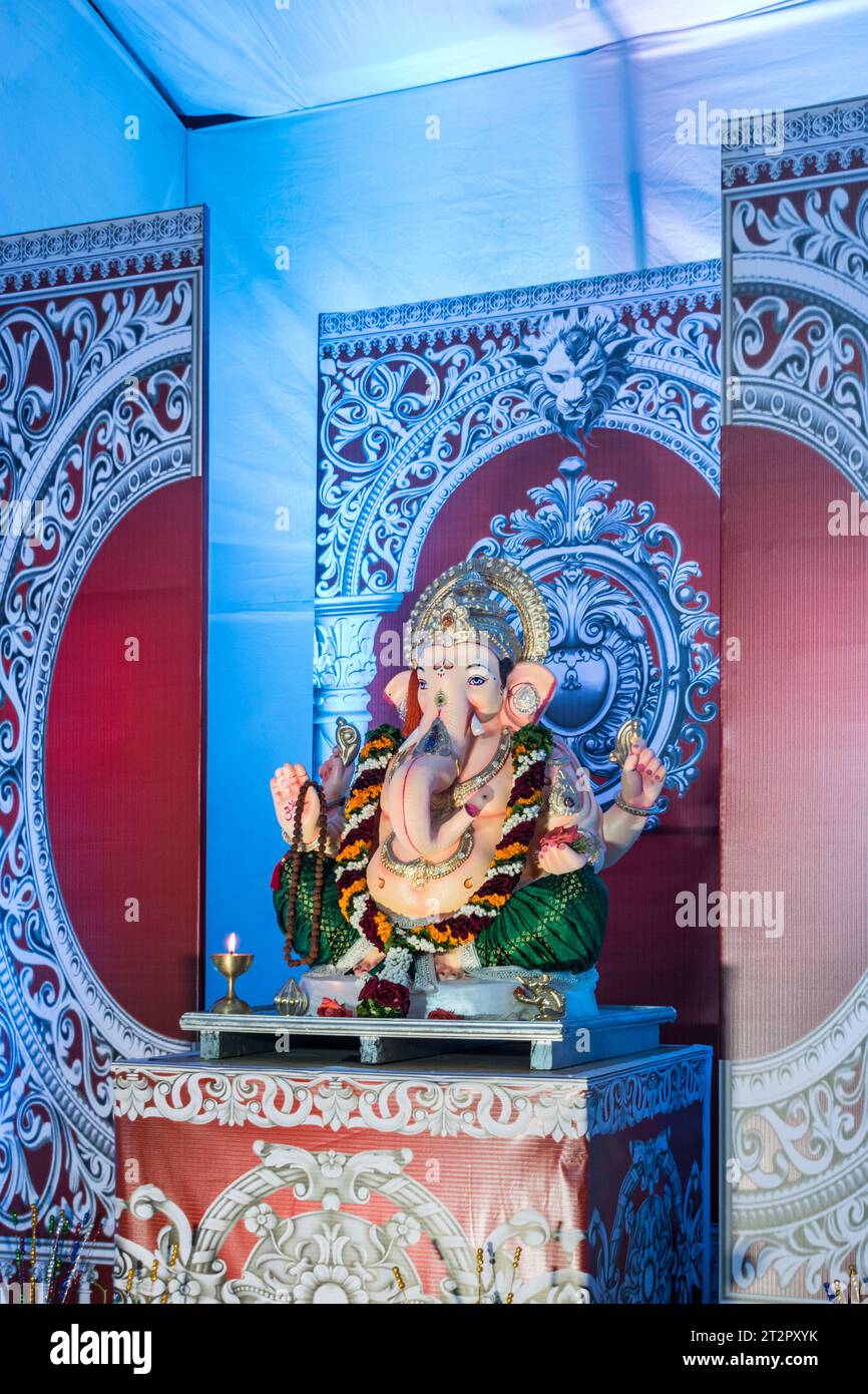 A beautiful idol of Lord Ganesha being worshipped at a mandal in Mumbai ...