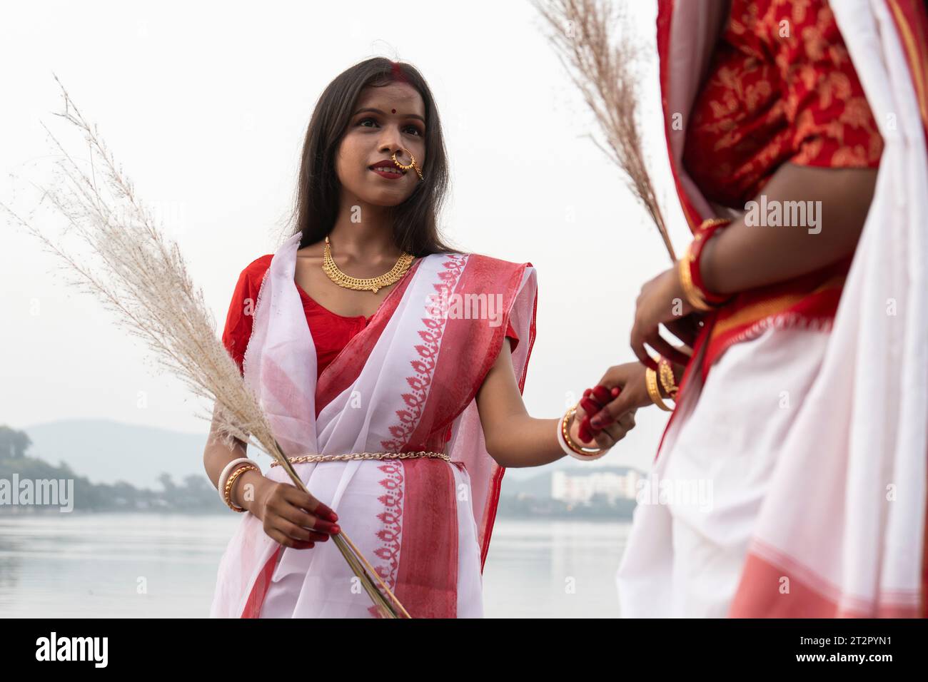 October 19, 2023: Young girls wearing traditional clothing pose for ...