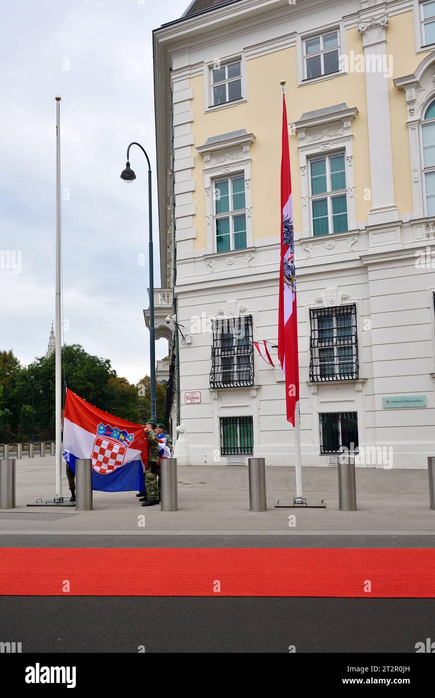 Vienna, Austria. Hoisting the Croatian flag in front of the Federal ...