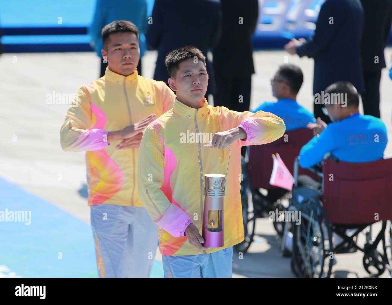 Hangzhou. 21st Oct, 2023. Photo shows the flame retrieval ceremony of ...