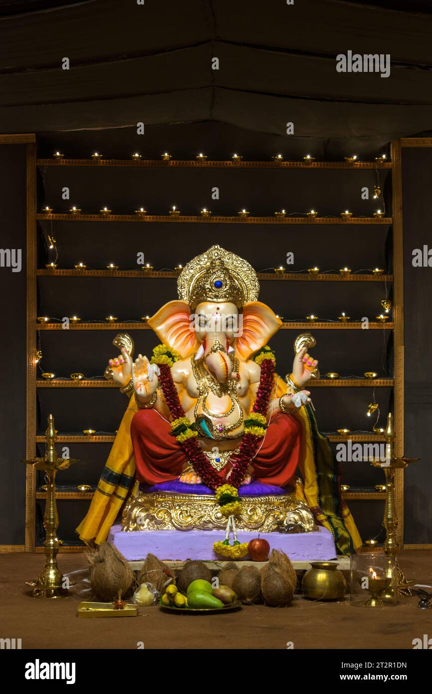 A beautiful idol of Lord Ganesha being worshipped at a mandal in Mumbai ...