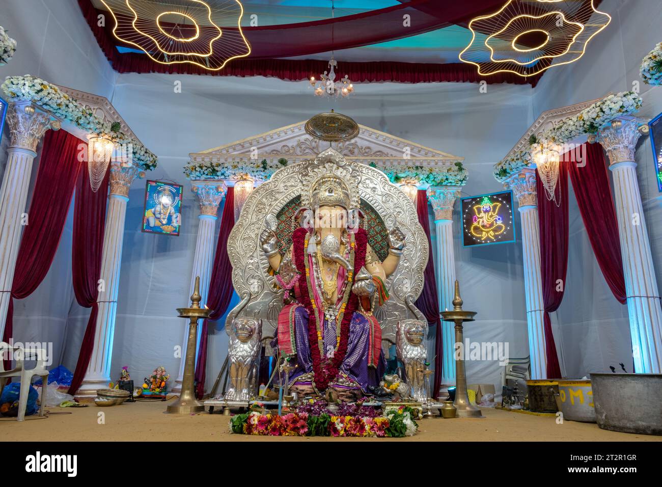 A beautiful idol of Lord Ganesha being worshipped at a mandal in Mumbai ...