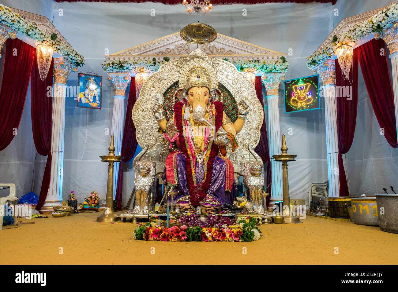 A beautiful idol of Lord Ganesha being worshipped at a mandal in Mumbai ...