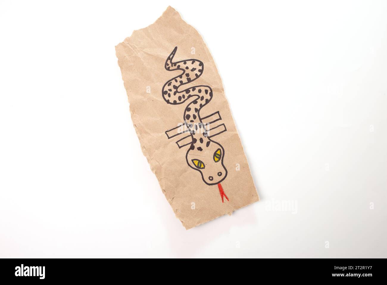 a snake or dragon made out of recycled paper, DIY, tutorial ...