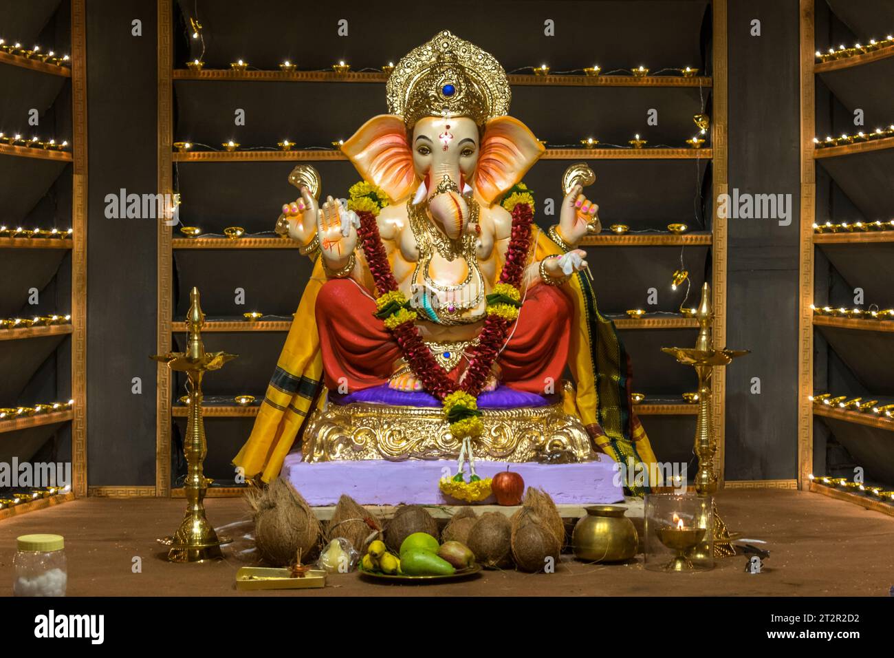 A beautiful idol of Lord Ganesha being worshipped at a mandal in Mumbai ...