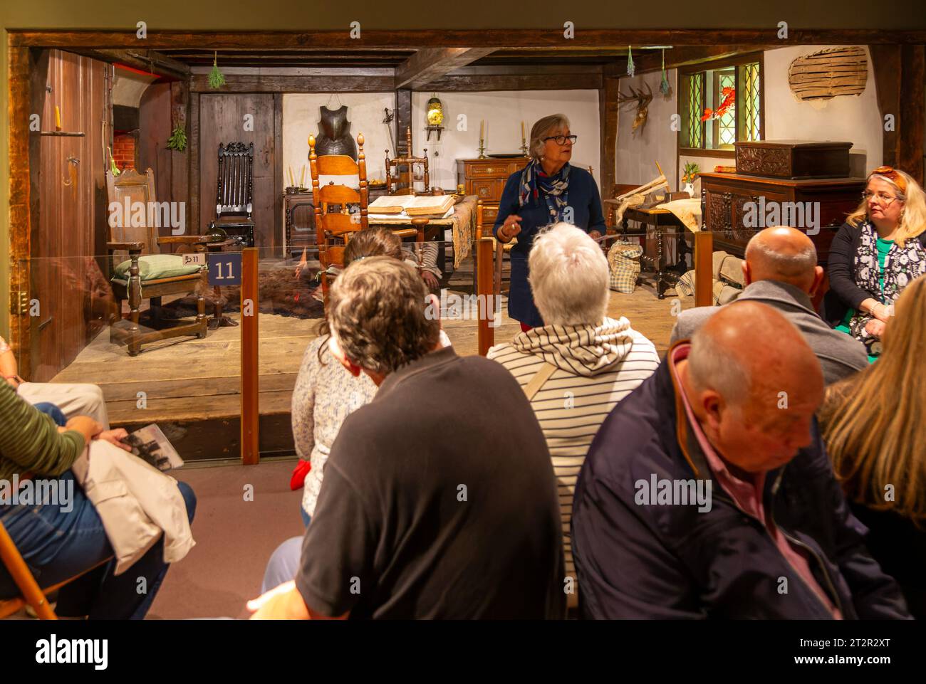 Speaker standing by Seventeenth century room, American museum ...